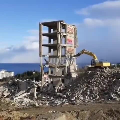 This is the end. Excavator waying building demolition fail - Coub